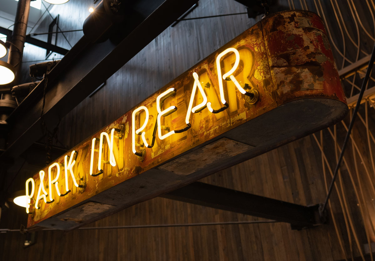 Park In Rear - The Lumi Neon Museum